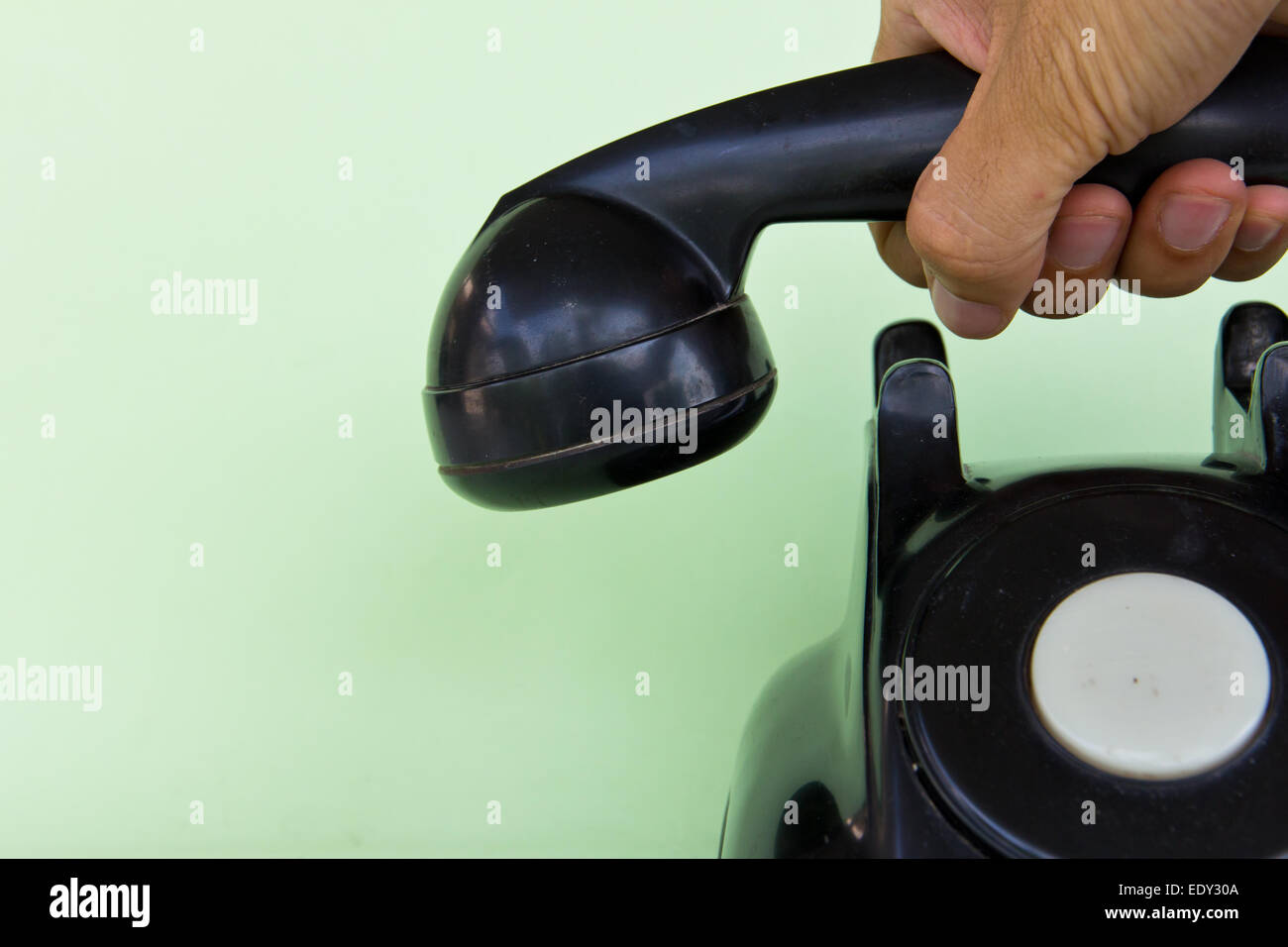 answer the telephone Stock Photo - Alamy