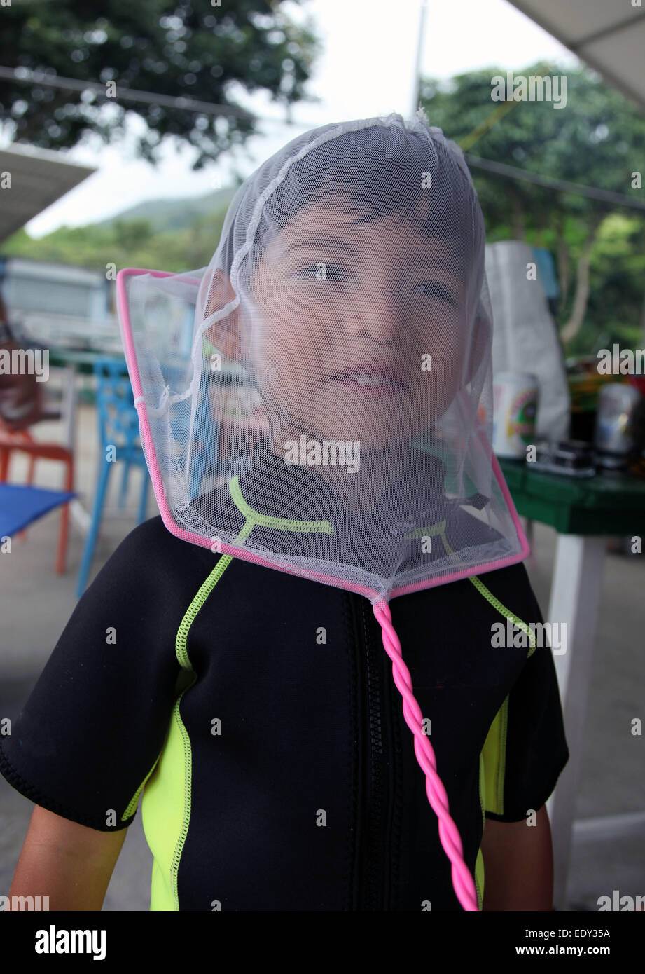 Boy with a net on his head hi-res stock photography and images - Alamy
