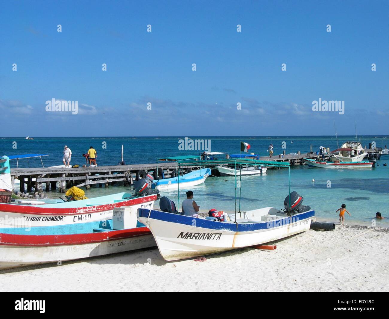Beach image Puerto Morelos with boats Stock Photo - Alamy