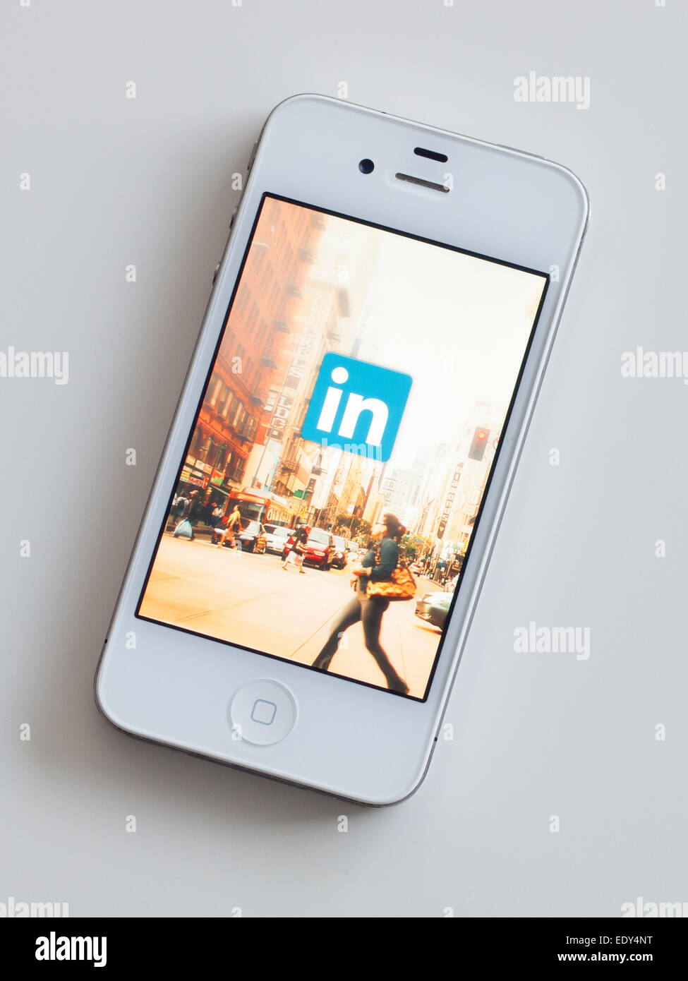 The homescreen and logo of the LinkedIn mobile app on a white Apple ...