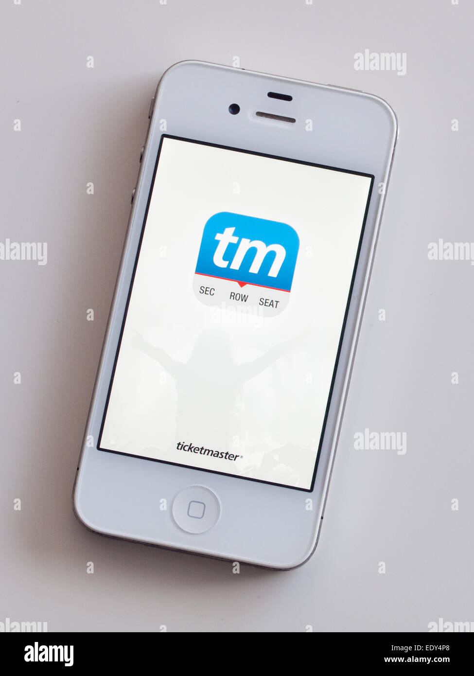 The homescreen and logo of the Ticketmaster mobile app on a white Apple ...