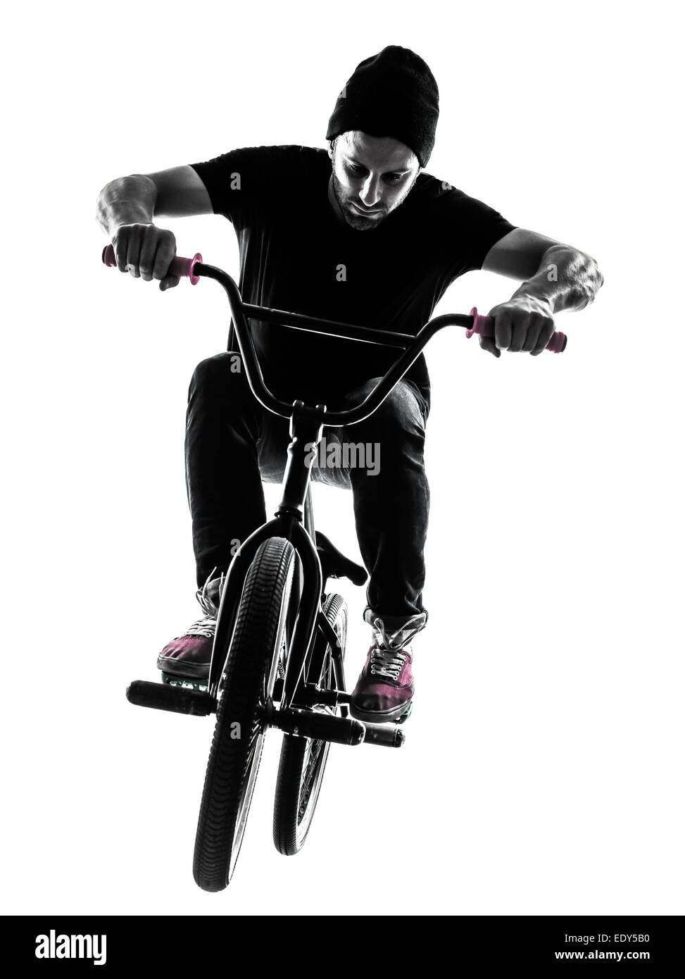 one man exercising bmx acrobatic figure in silhouette studio isolated ...