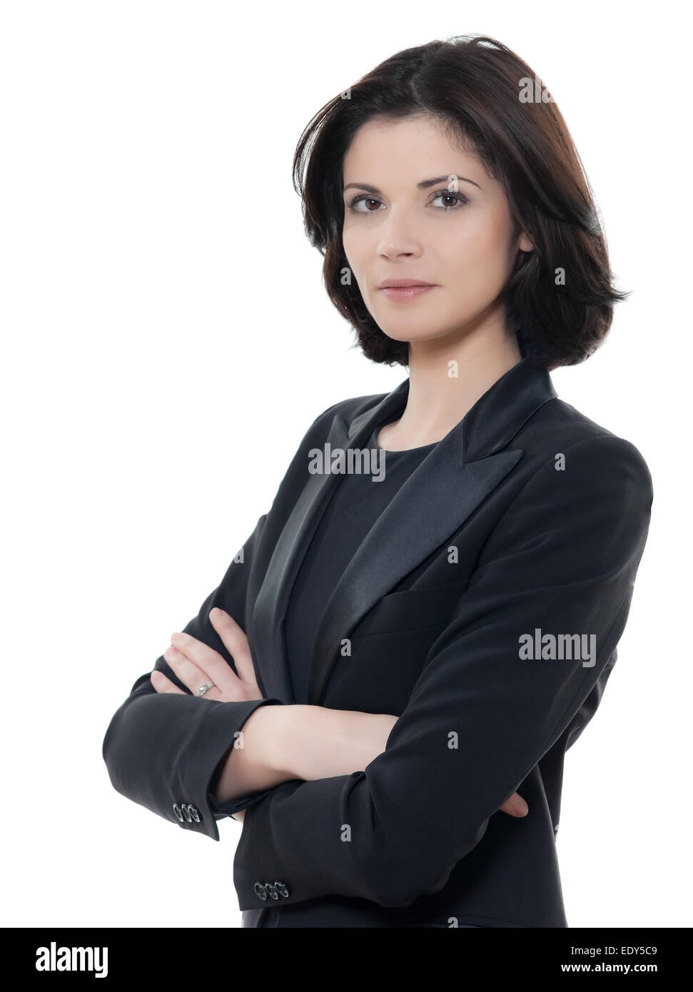 one beautiful serious business woman portrait arms crossed in studio ...