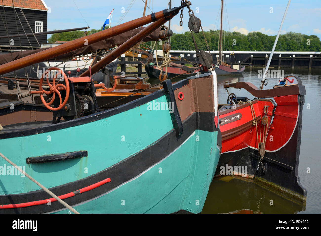Old Dutch boats in the harbour, Zuiderzee open air museum, Lake Ijssel ...