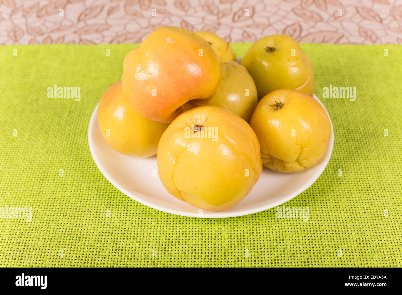 pickled apples on the plate closeup Stock Photo - Alamy