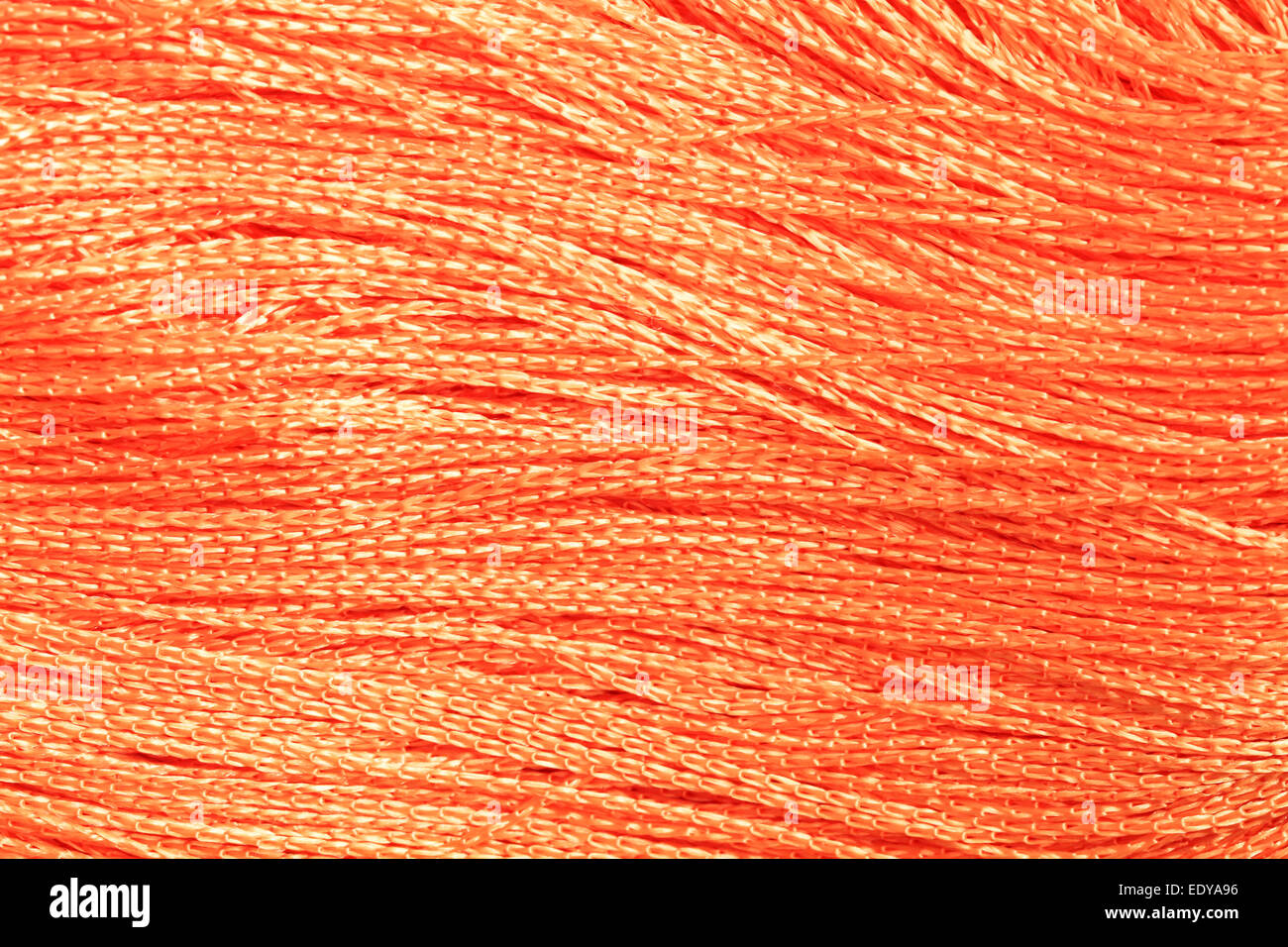 Orange string as a background image Stock Photo - Alamy