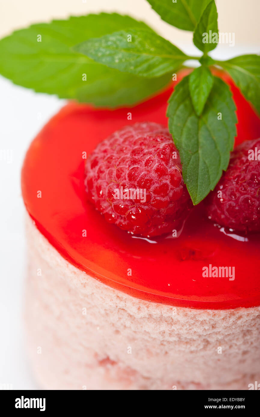 fresh raspberry cake mousse dessert round shape with mint leaves Stock ...
