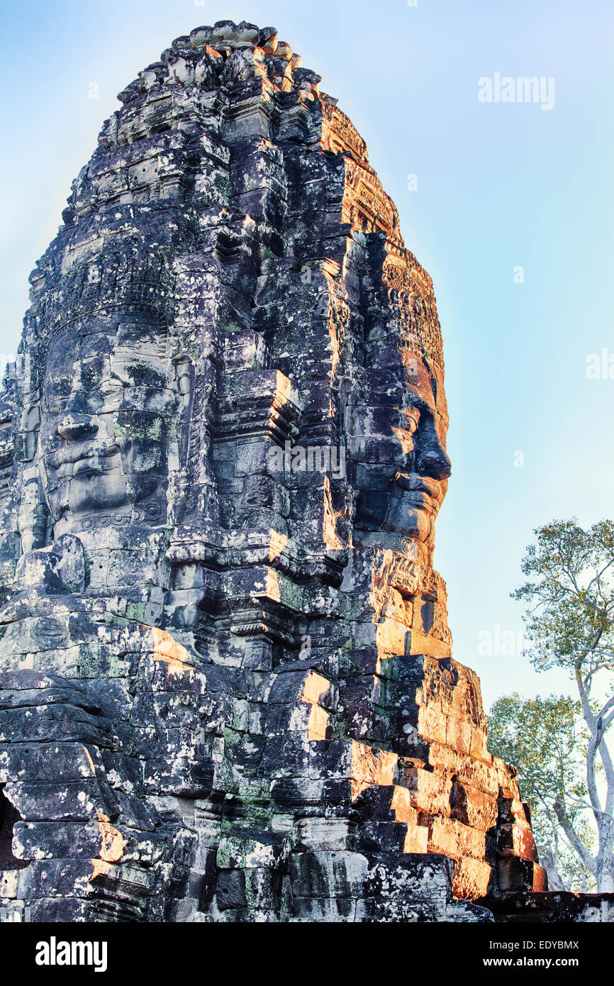 Bayon temple statue carving of the face Stock Photo - Alamy