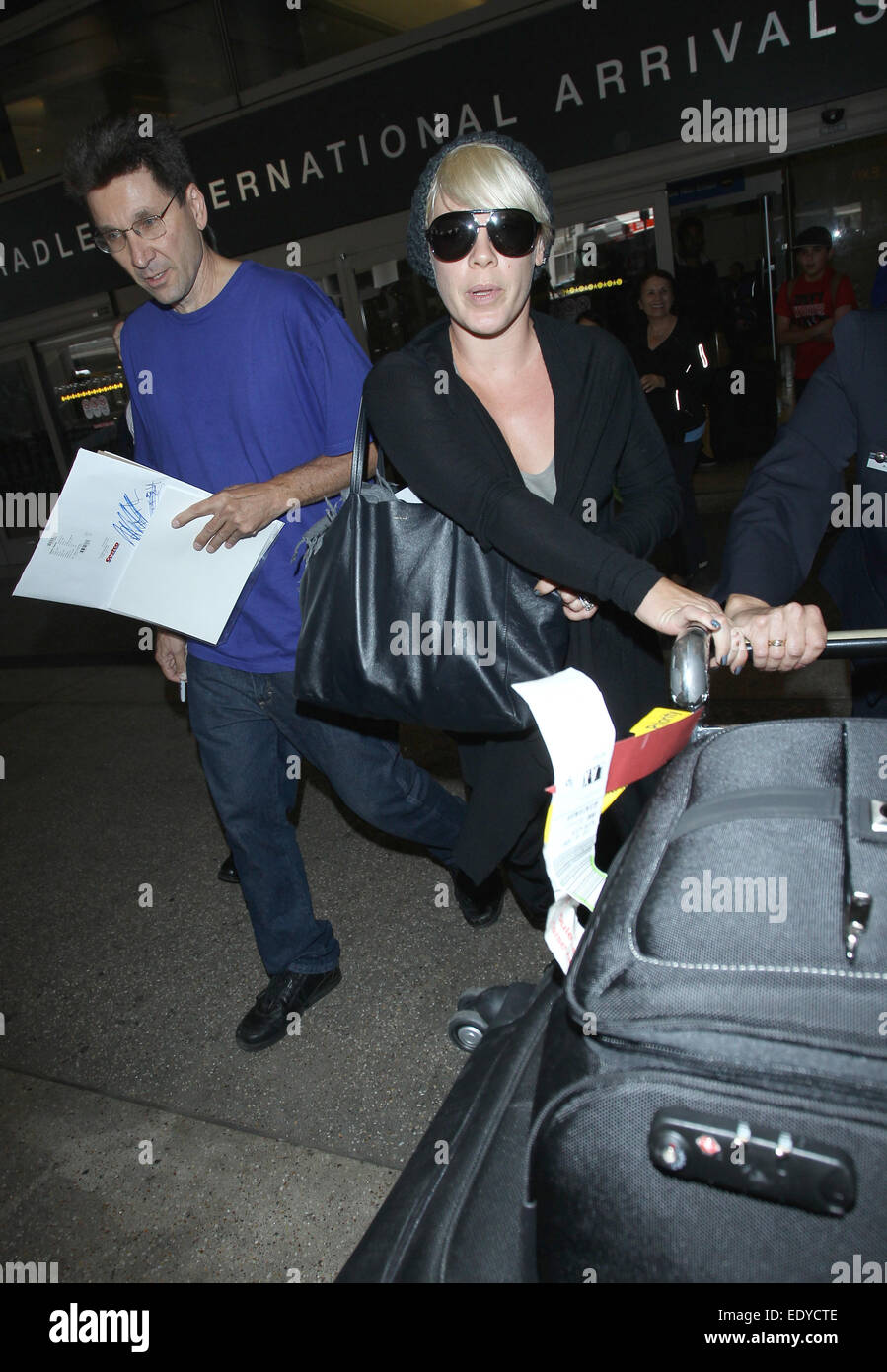 Pink (real name Alicia Moore) arrives at Los Angeles International ...