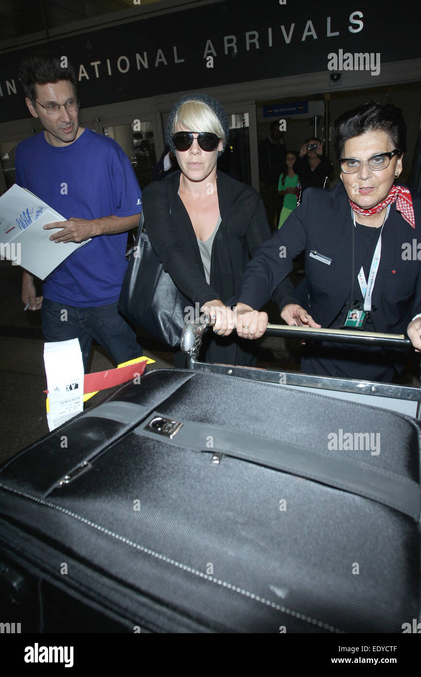 Pink (real name Alicia Moore) arrives at Los Angeles International ...