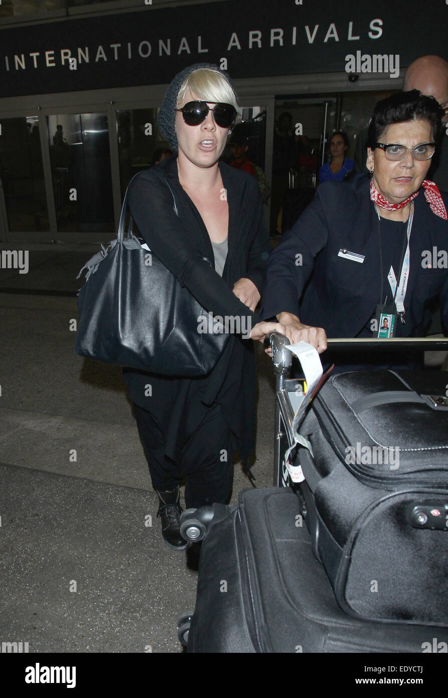 Pink (real name Alicia Moore) arrives at Los Angeles International ...