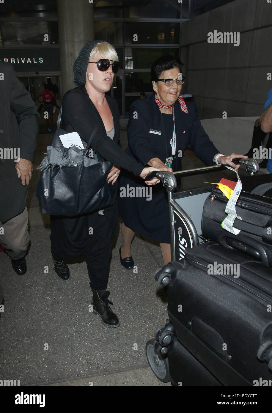 Pink (real name Alicia Moore) arrives at Los Angeles International ...