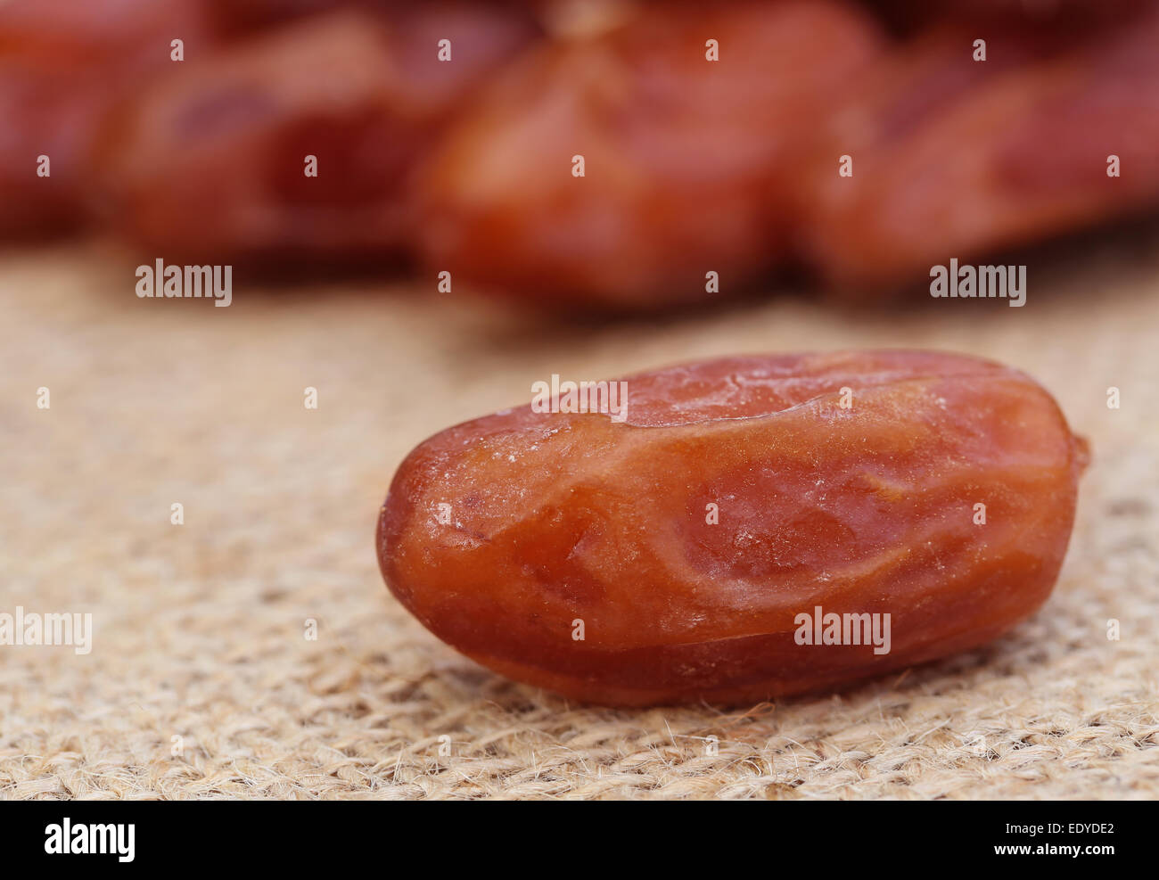 Arabian Dates on textured surface Stock Photo - Alamy