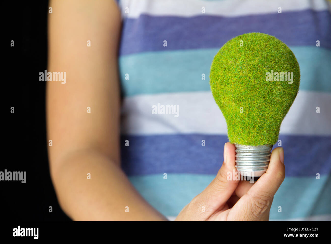 hand holding eco light bulb, save energy concept Stock Photo - Alamy