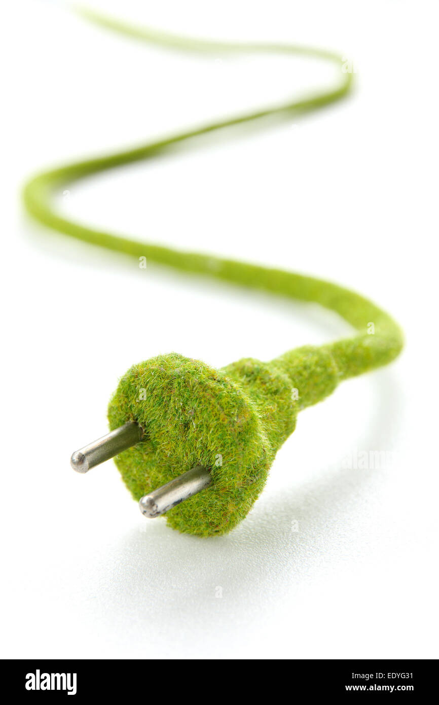 green electric plug, save energy concept Stock Photo - Alamy