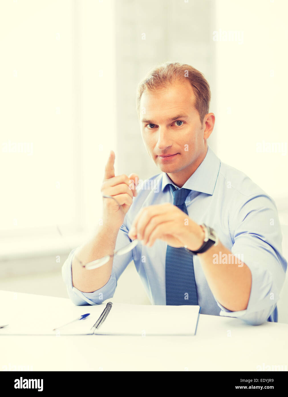 businessman showing warning gesture Stock Photo - Alamy