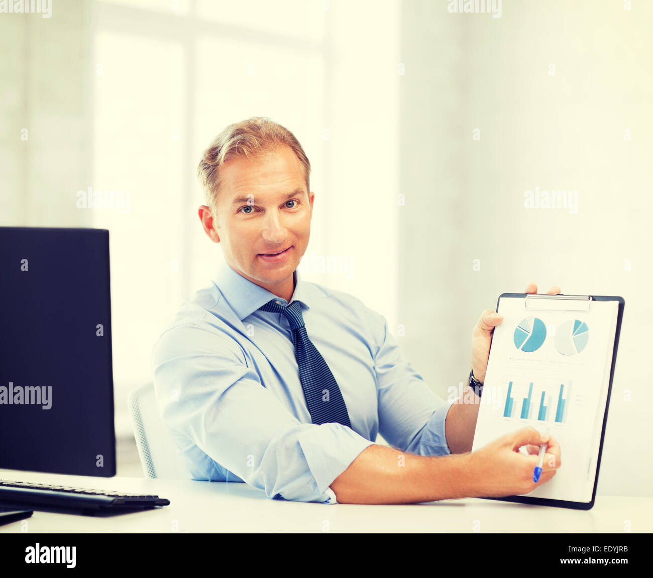 businessman showing graphs and charts Stock Photo - Alamy