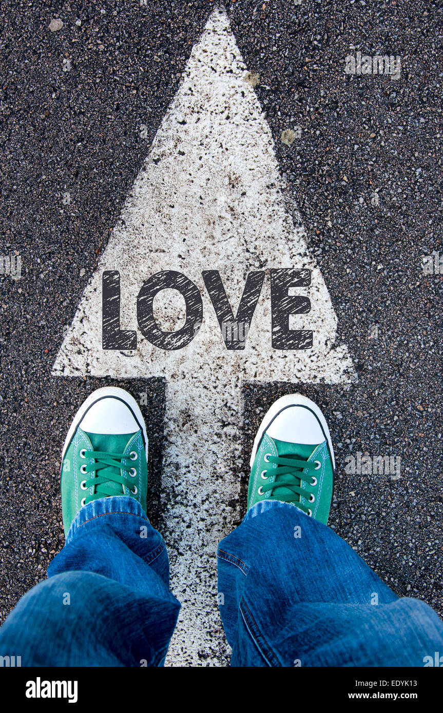 Green shoes standing on your love sign Stock Photo - Alamy