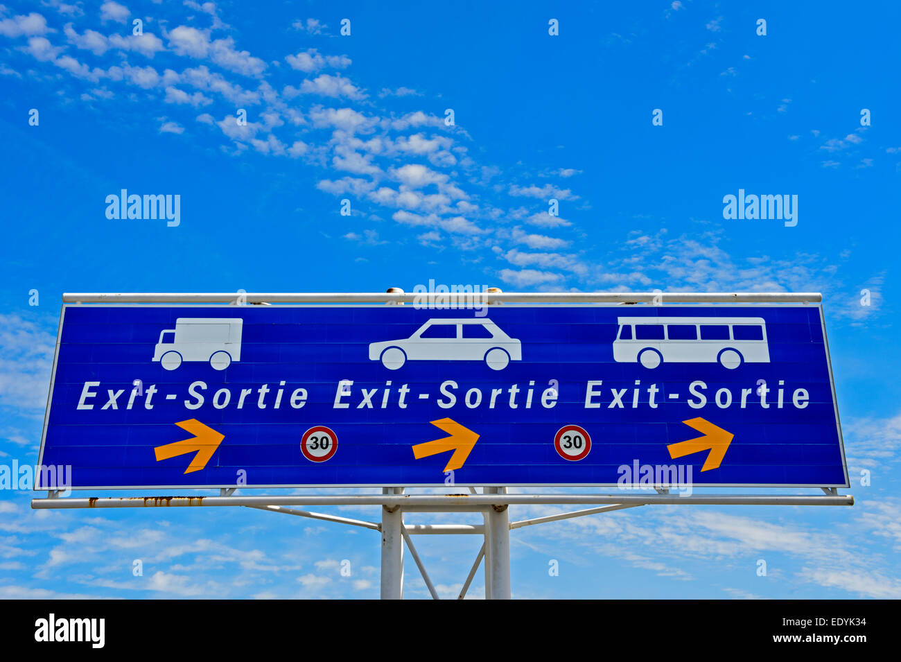 Sign for the exit for motor vehicles in the port area, Calais, France ...