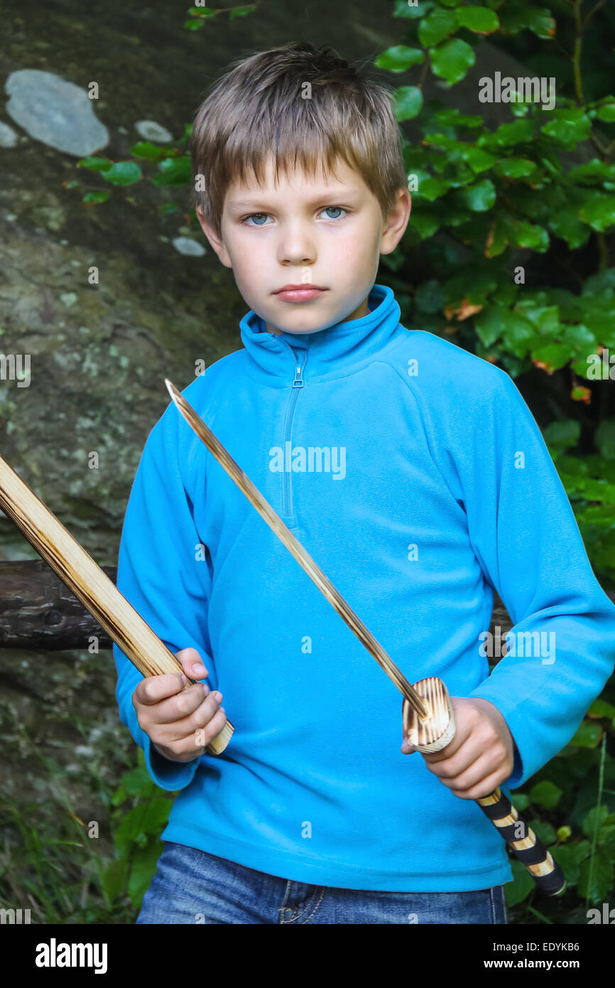 Boy wooden sword hi-res stock photography and images - Alamy