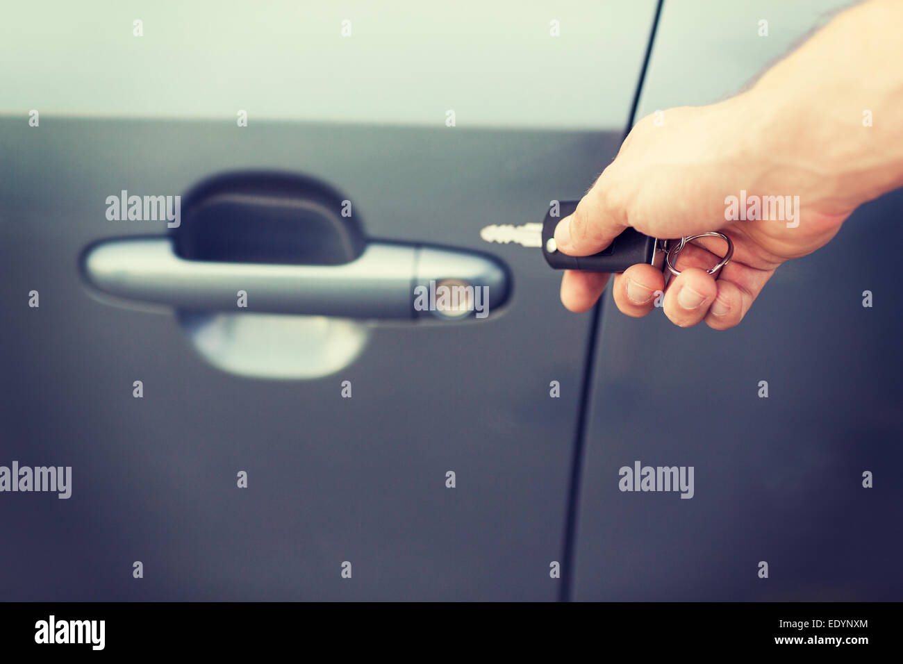 man with car key outside Stock Photo - Alamy