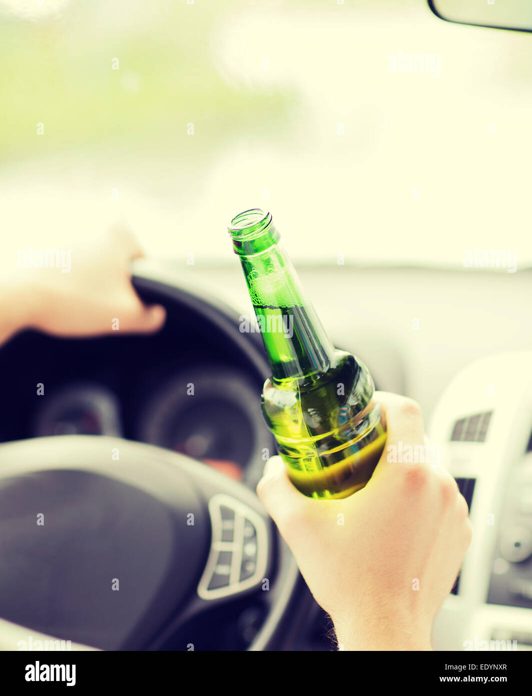 man drinking alcohol while driving the car Stock Photo - Alamy