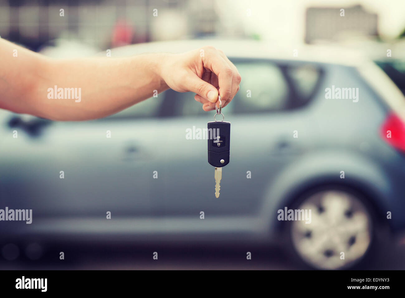 man with car key outside Stock Photo - Alamy