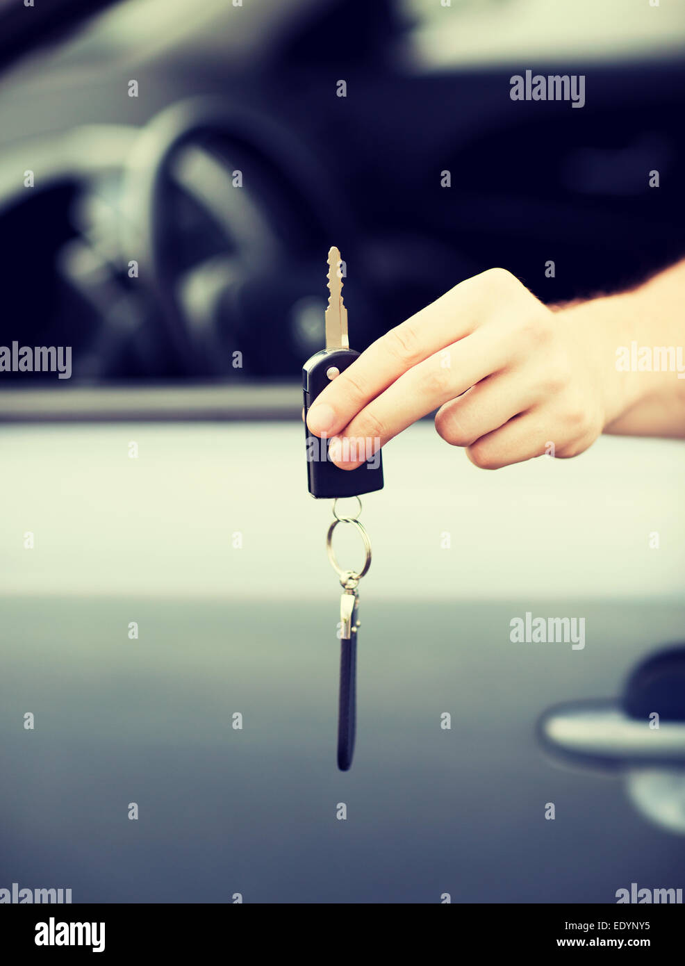 man with car key outside Stock Photo - Alamy