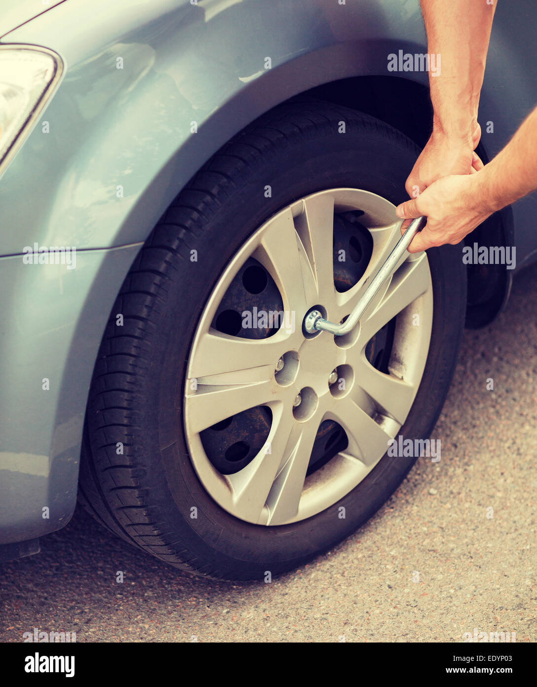 Replacing tyre hi-res stock photography and images - Alamy