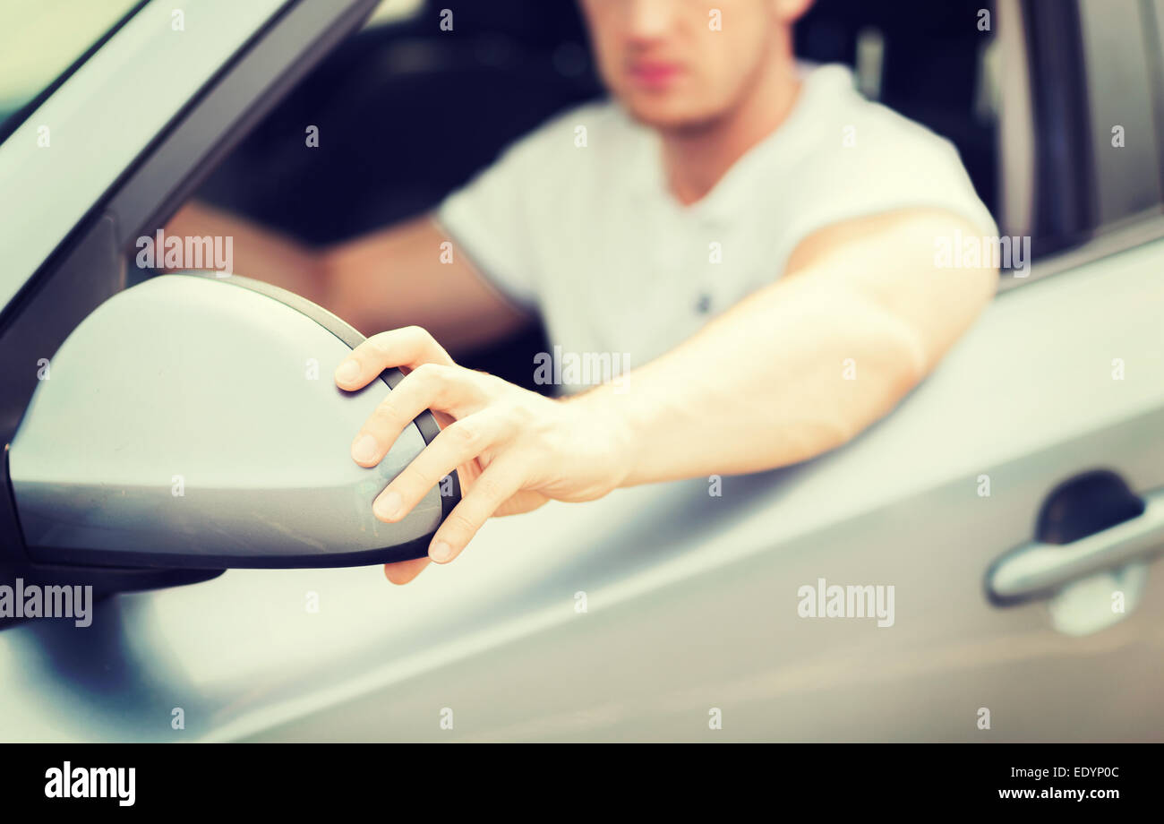 Checking rear view mirror hi-res stock photography and images - Alamy