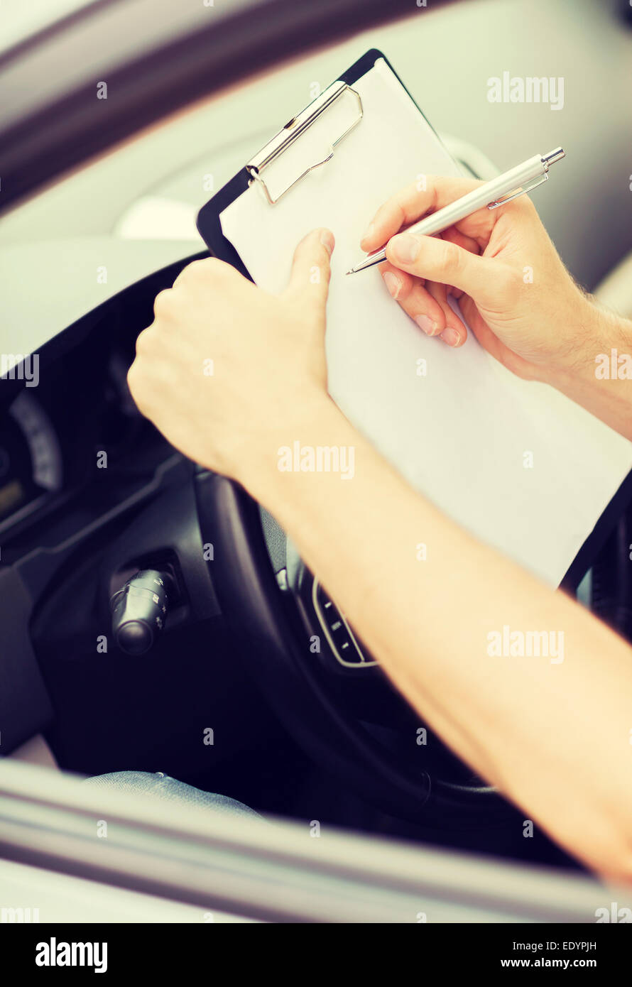 man with car documents Stock Photo - Alamy