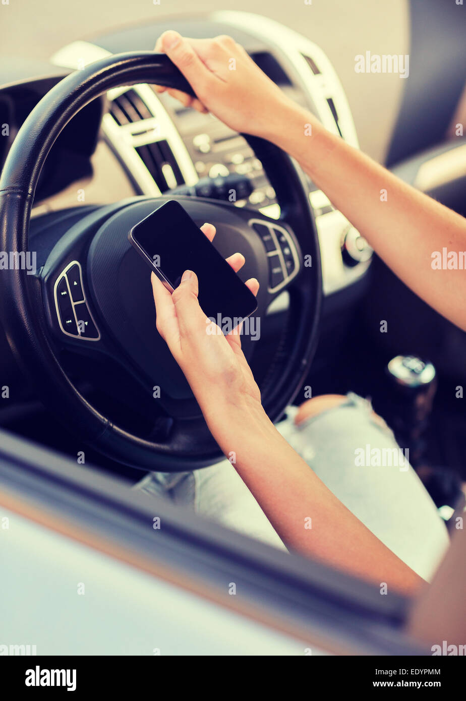 woman using phone while driving the car Stock Photo - Alamy