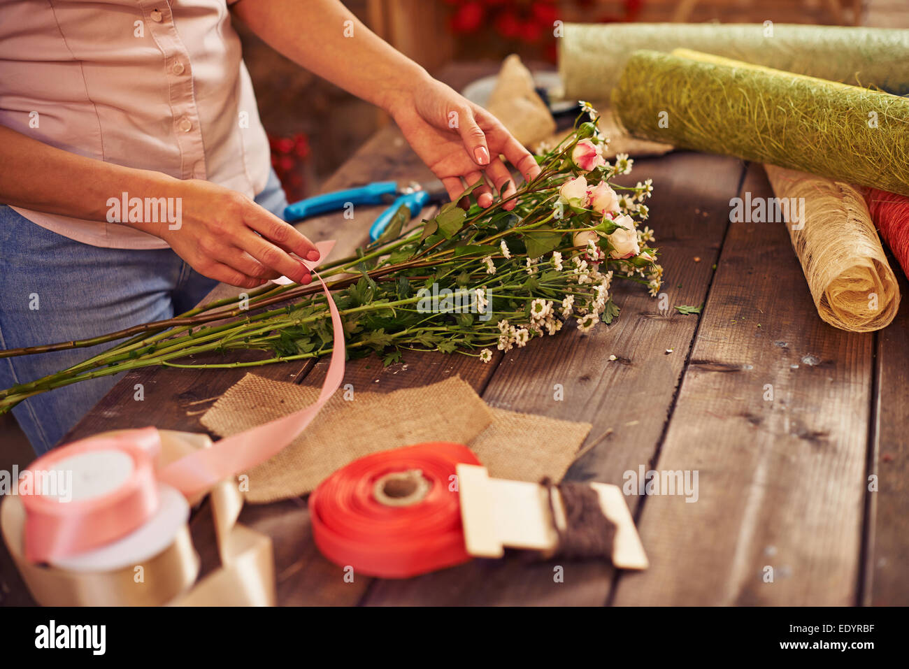 Hand over bouquet flowers hi-res stock photography and images - Alamy