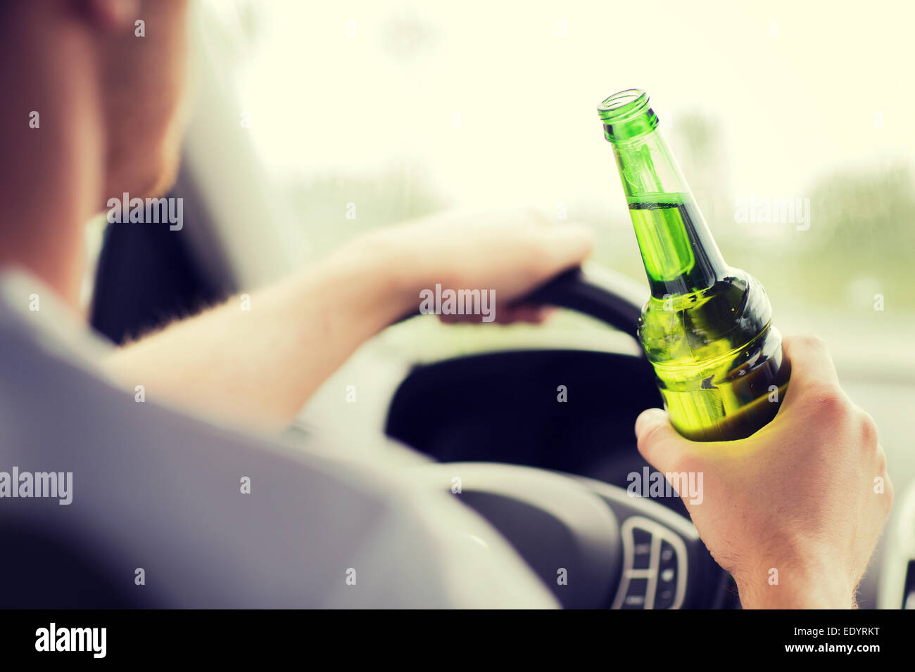 man drinking alcohol while driving the car Stock Photo - Alamy