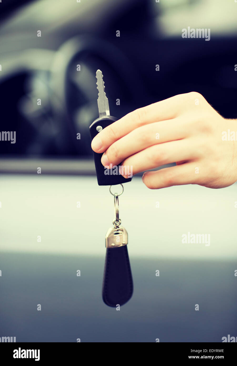 man with car key outside Stock Photo - Alamy