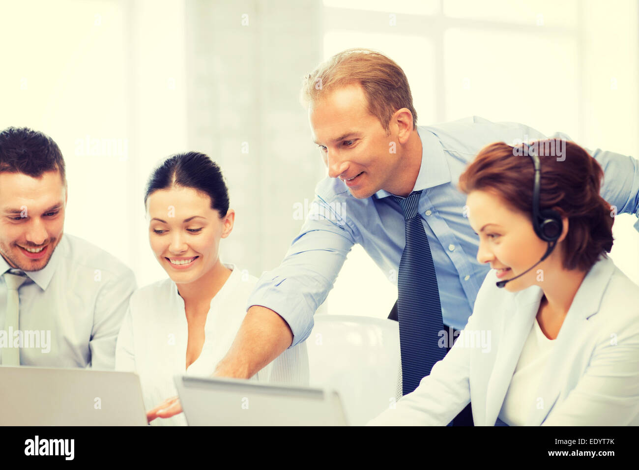 group of people working in call center Stock Photo - Alamy