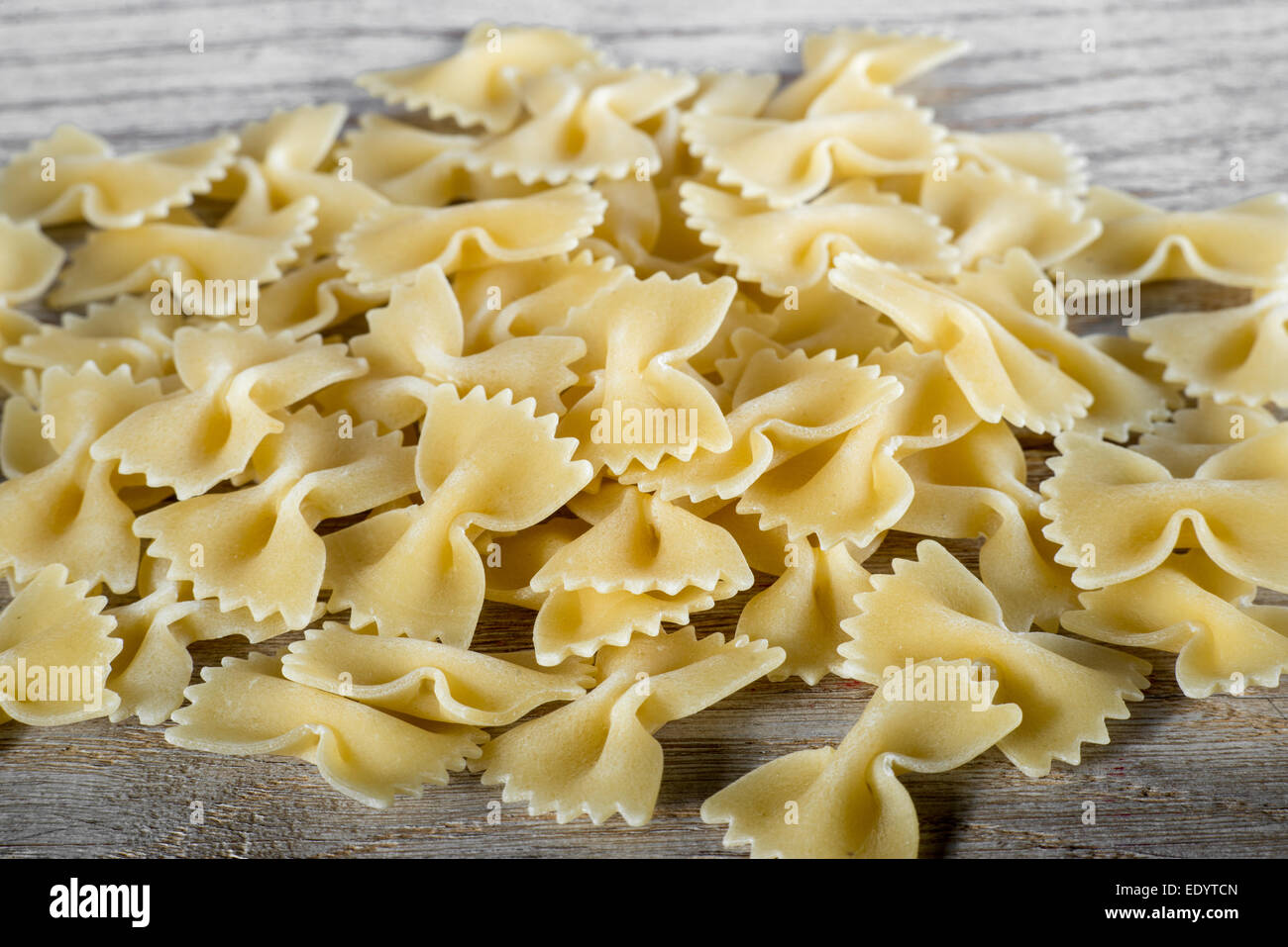 Farfalle pasta pile Stock Photo - Alamy