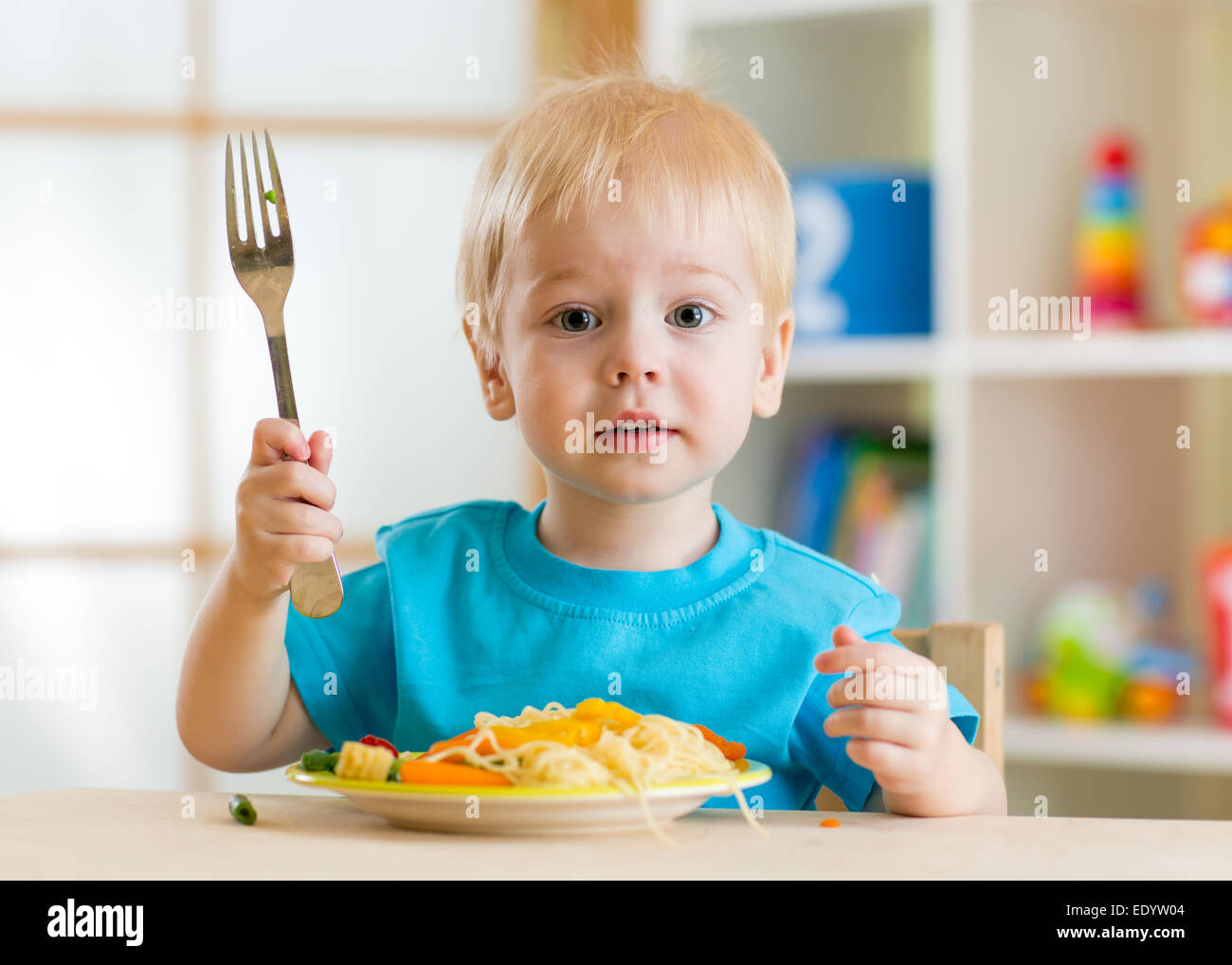 kid eating healthy food at home Stock Photo - Alamy