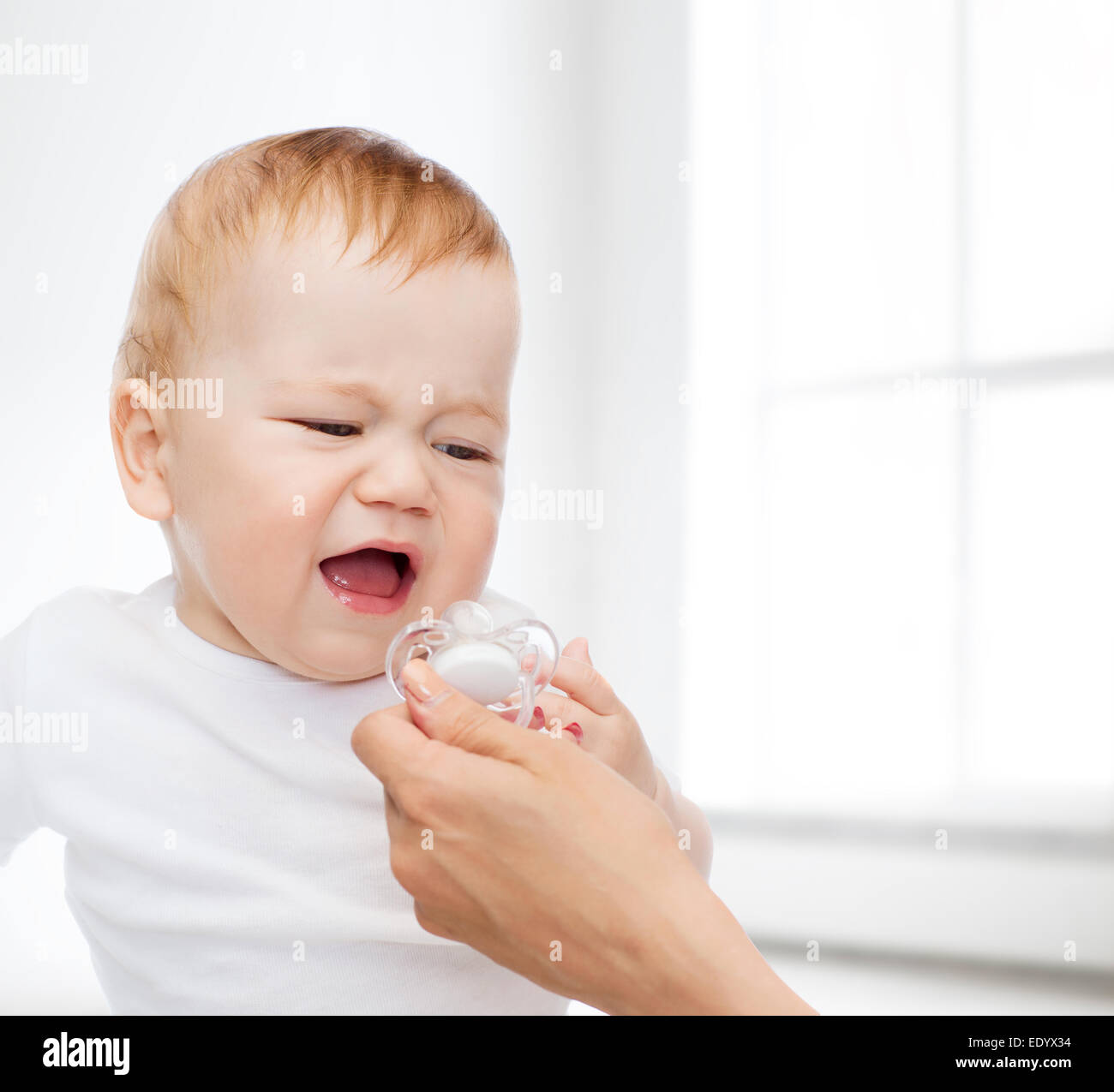 Baby teeth crying hi-res stock photography and images - Alamy