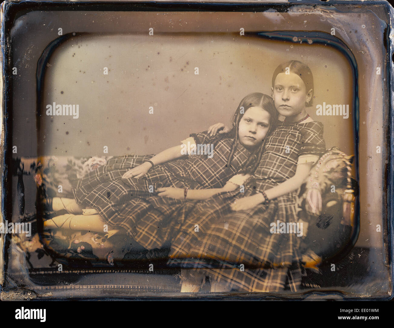 [Portrait of two girls reclining on chaise lounge]; Sheldon K. Nichols ...