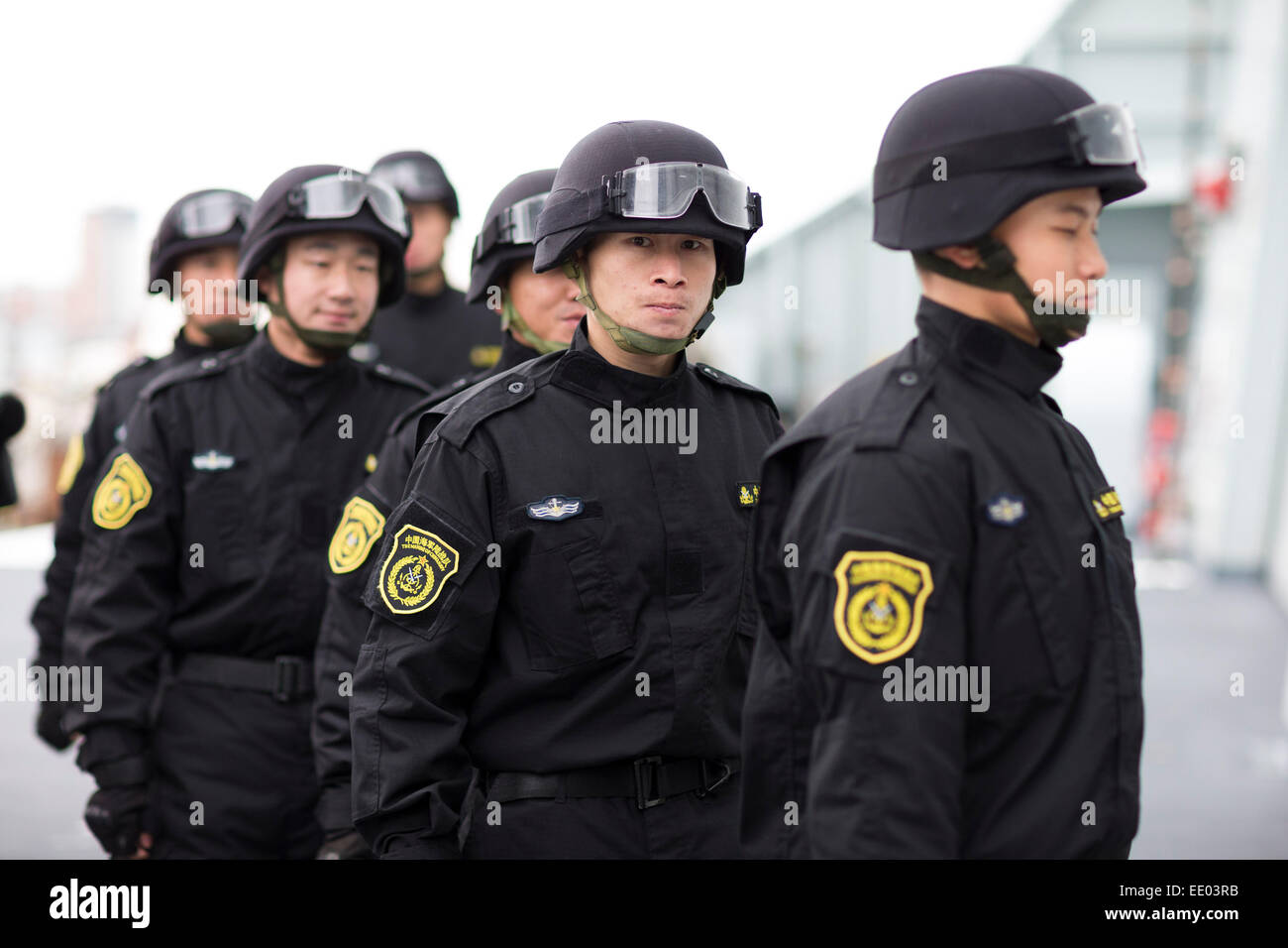 Sailors from the Chinese Naval assault ship Chang Bai Shan gather ...