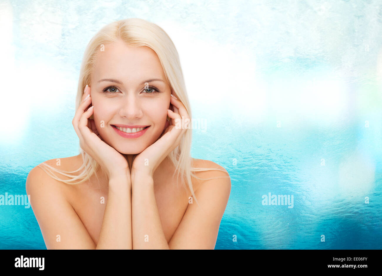 beautiful woman touching her face skin Stock Photo - Alamy