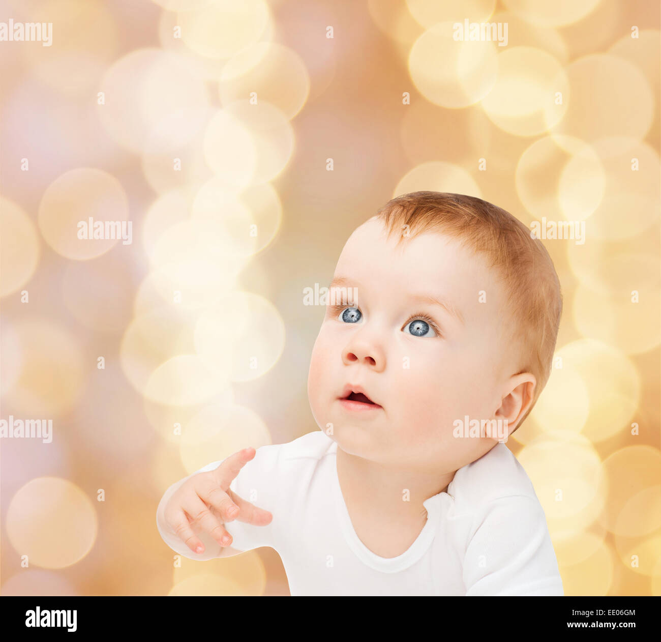 curious baby looking up Stock Photo - Alamy
