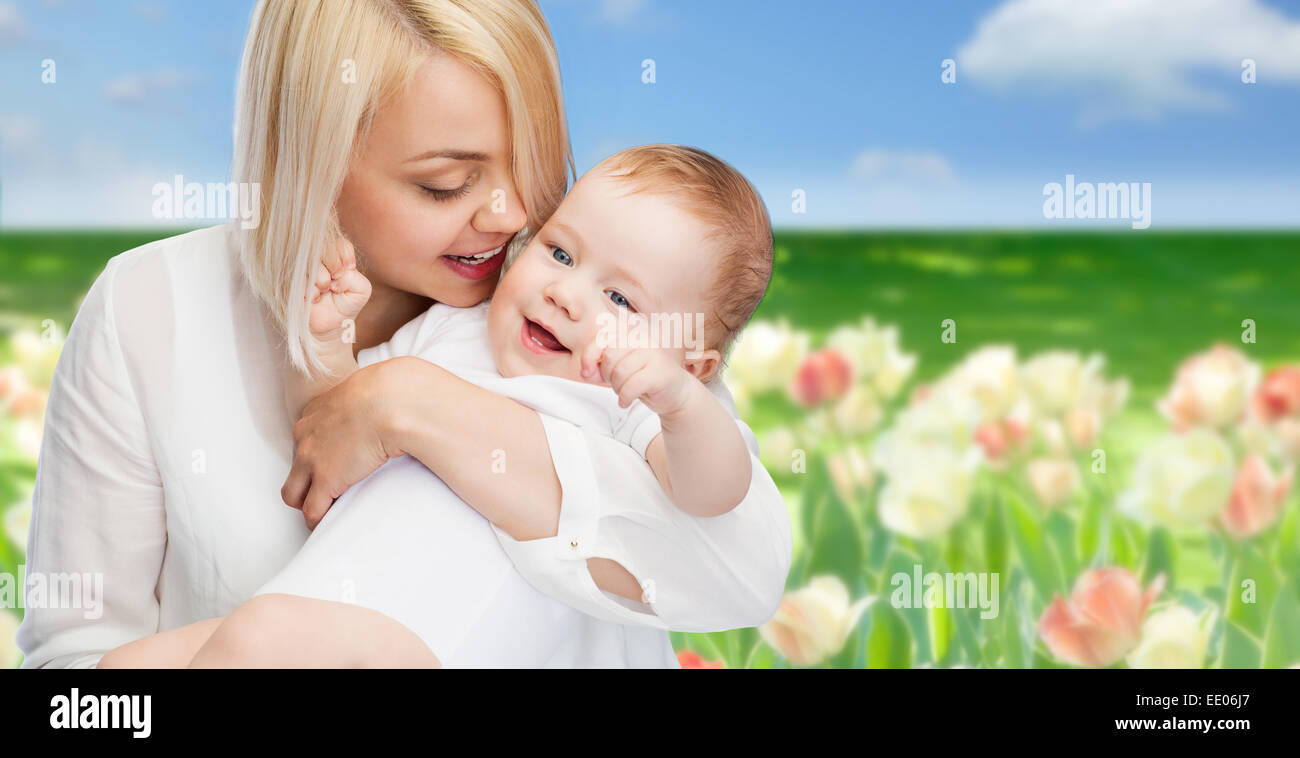 happy mother with smiling baby Stock Photo - Alamy