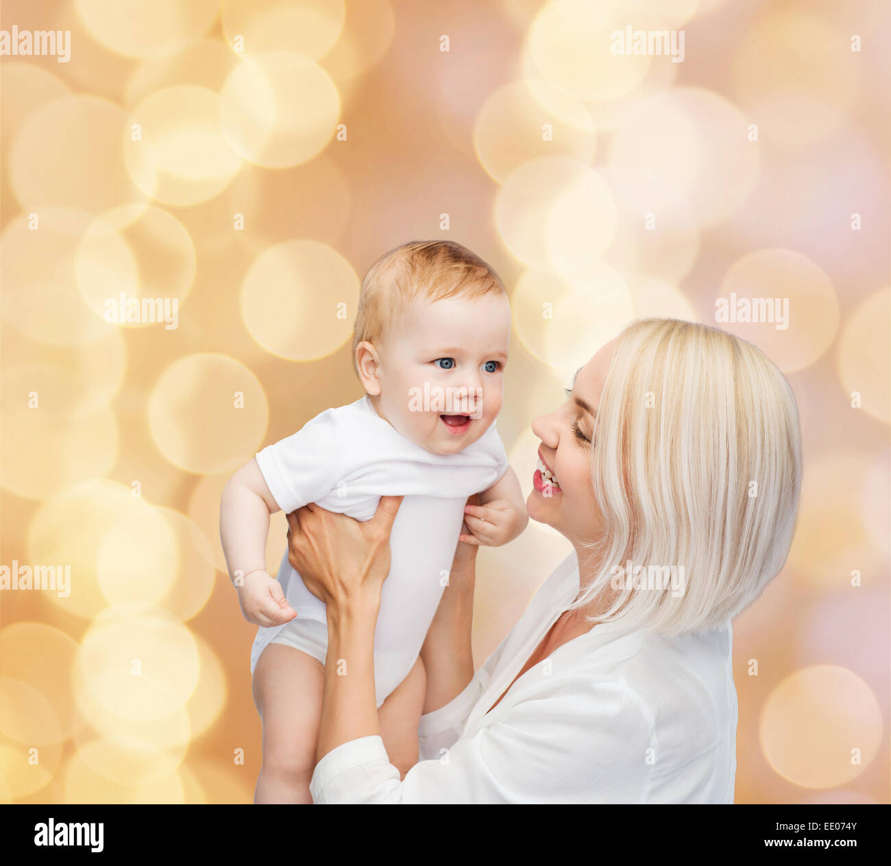 happy mother with smiling baby Stock Photo - Alamy