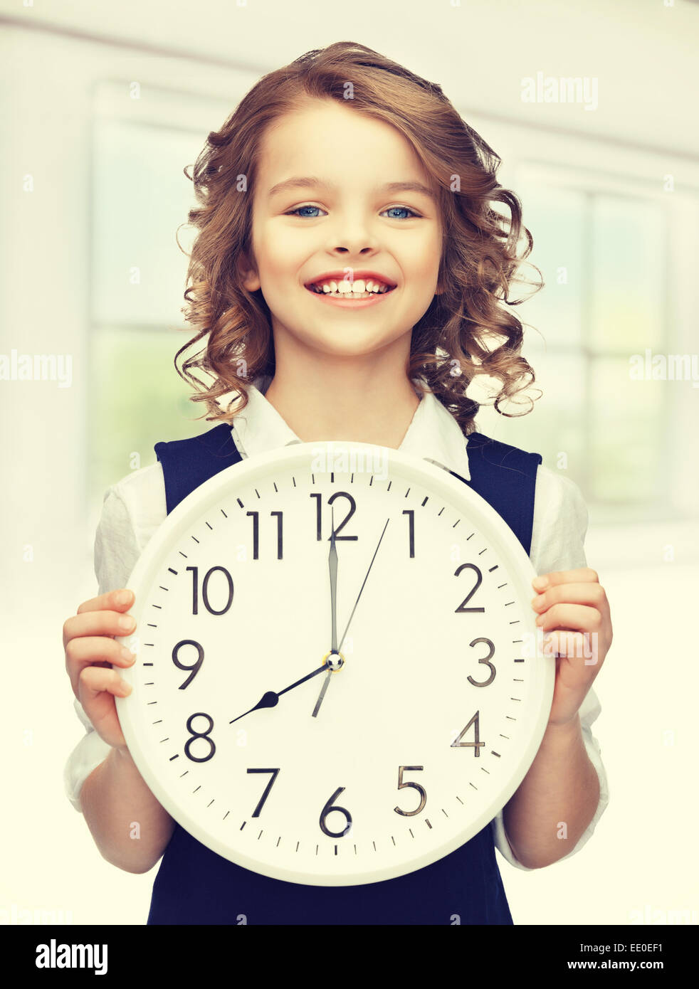 girl with big clock Stock Photo - Alamy