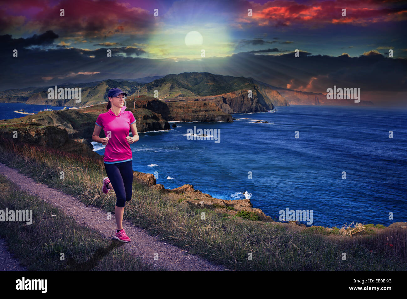 a woman running through the rural landscape Stock Photo - Alamy