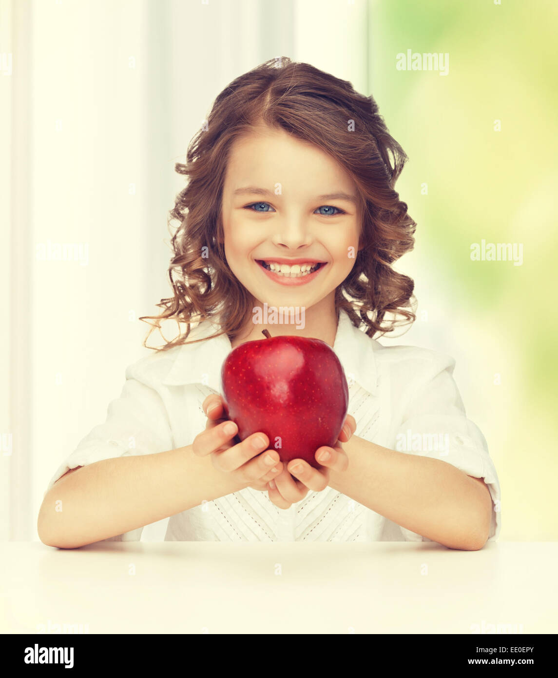girl with red apple Stock Photo - Alamy