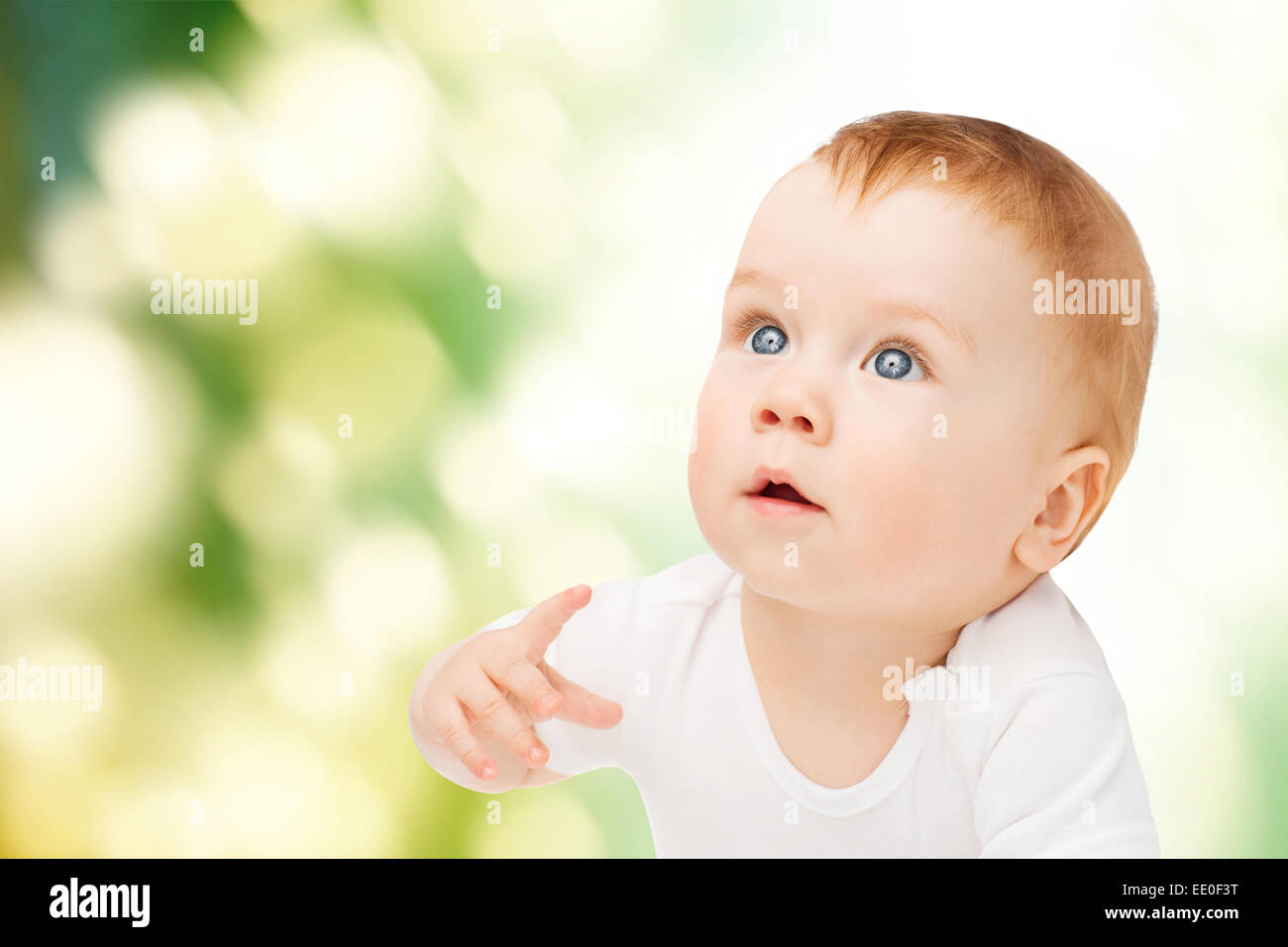 curious baby looking up Stock Photo - Alamy
