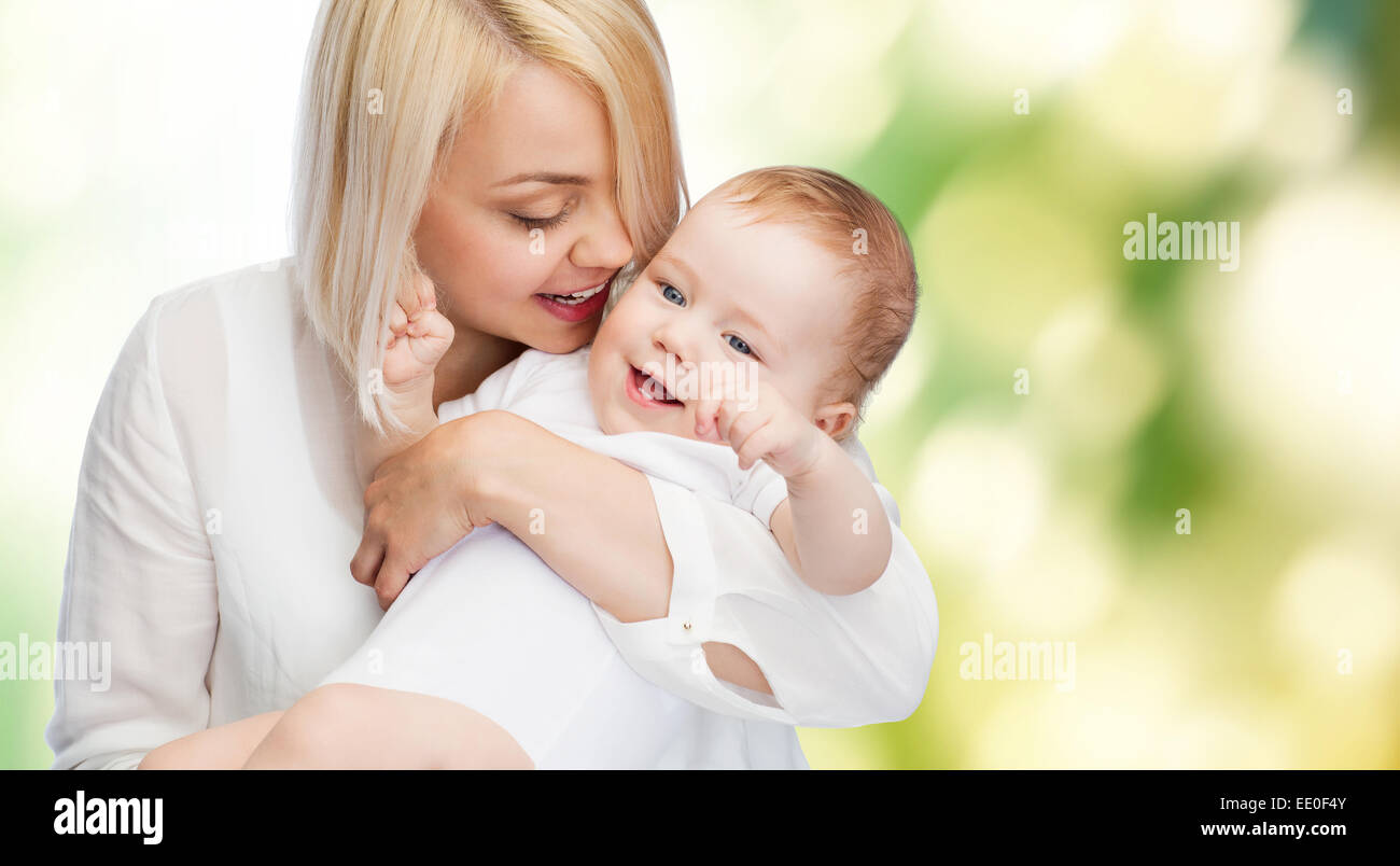 happy mother with smiling baby Stock Photo - Alamy